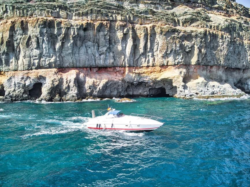 Boat ride from Puerto de Mogán along the coastline to Güigüi - The Itinerary Breakdown