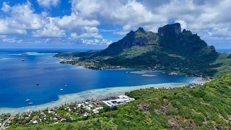 Aerial view of Bora Bora's lagoon and lush mountains