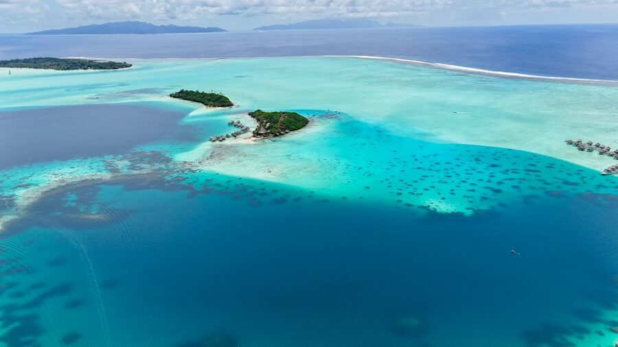 Aerial view of Bora Bora's turquoise lagoon and lush green islands