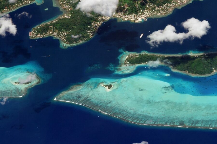 Motu Tapu small islet in Bora Bora lagoon, aerial view