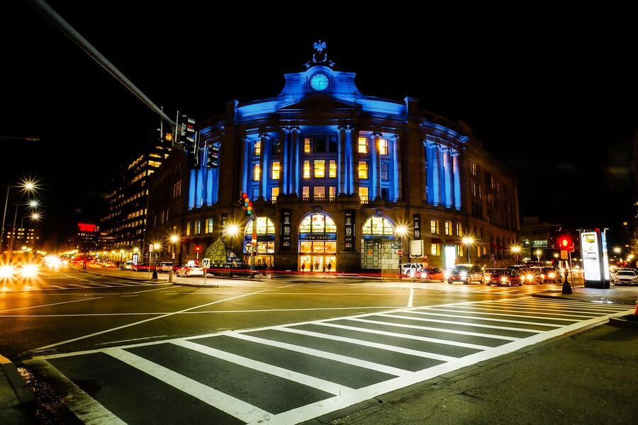 Downtown Boston at night with illuminated historic buildings and modern skyline