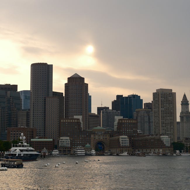 Boston skyline and harbor at dusk