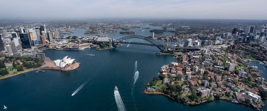 Aerial view of the Sydney Opera House and Harbour Bridge in daylight