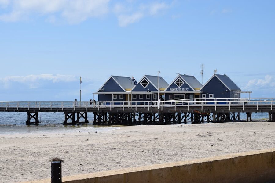 The Busselton Jetty extending out over the beach in Western Australia