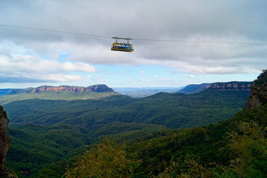 Cable car above lush valleys in Blue Mountains