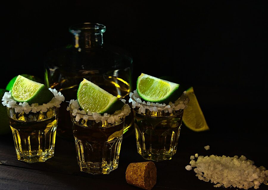 Tequila shot with lime, salt and raw agave
