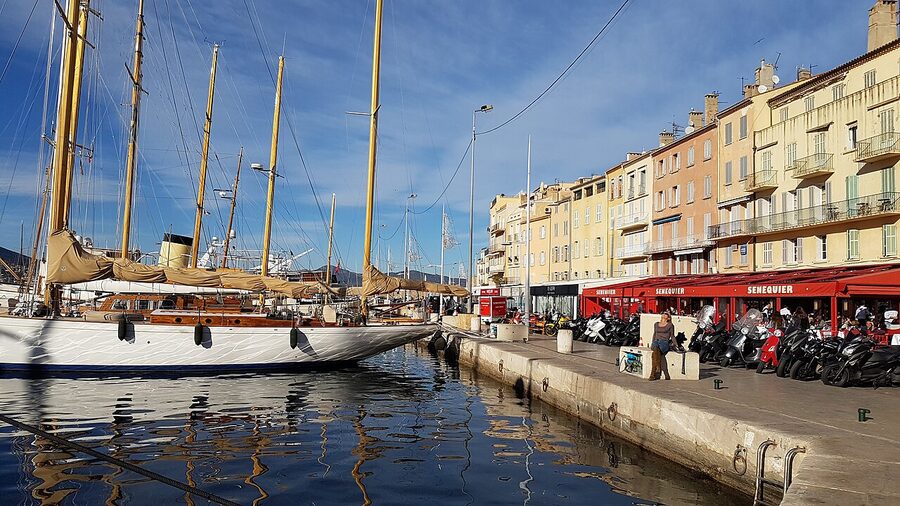 Cafe Senequier with red awnings on Saint-Tropez harbour