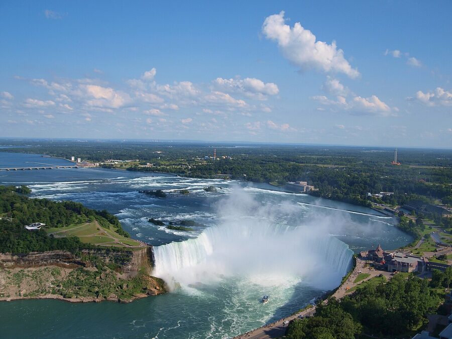Canadian Horseshoe Falls with the city of Niagara Falls Ontario rising behind it