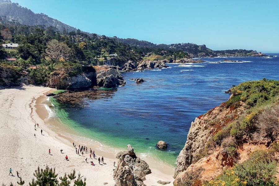 Carmel-by-the-Sea coastline with people on the beach