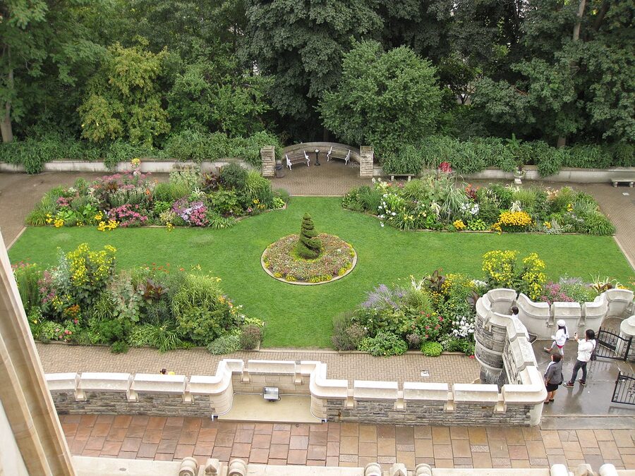 Casa Loma gardens with formal plantings and castle in background
