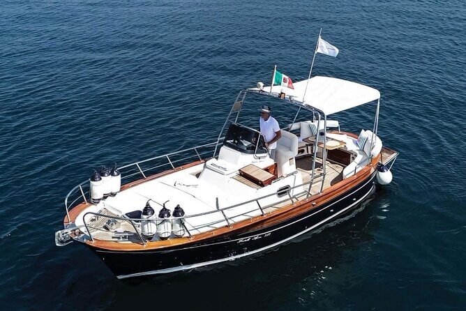 Catamaran tour stops bathing and snorkeling toast with prosecco - Practical Details and What to Expect