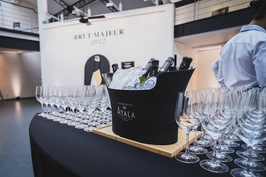 Champagne bottles ice bucket tasting setup elegant