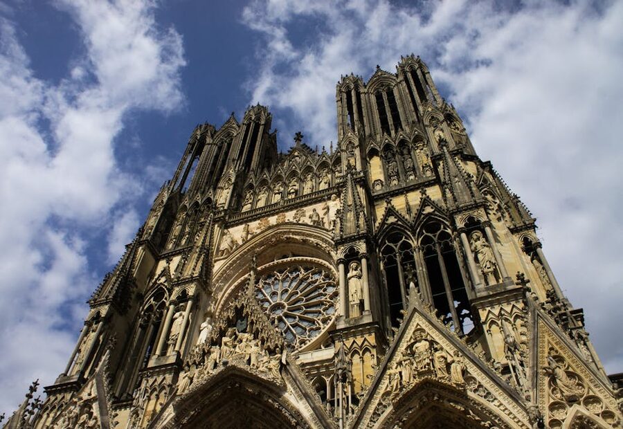 Reims Cathedral Gothic facade low angle morning