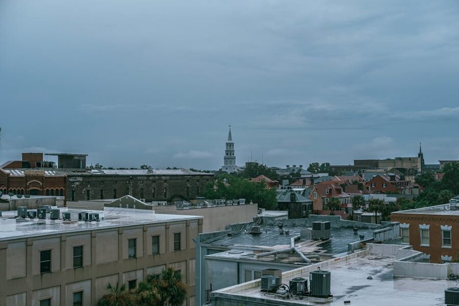 Aerial view of Charleston SC historic downtown under cloudy sky