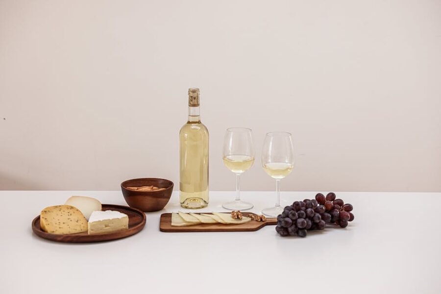 Cheese and wine pairing platter with grapes