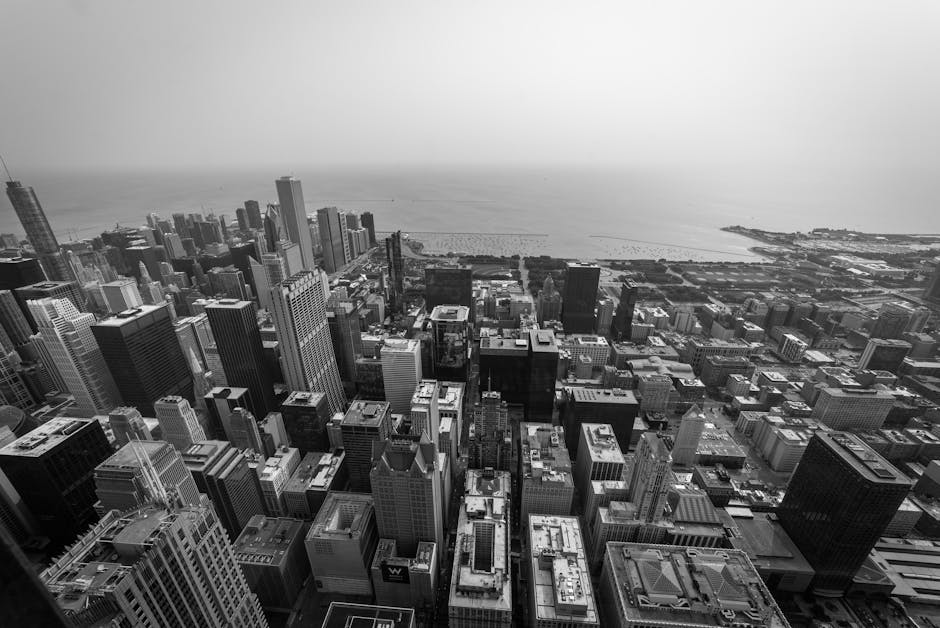 Aerial view of Chicago skyscrapers and Lake Michigan in black and white