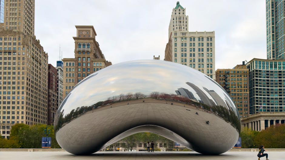 Cloud Gate sculpture reflecting Chicago skyline
