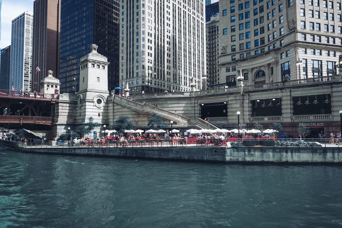 Chicago Riverwalk with iconic architecture and serene water reflections