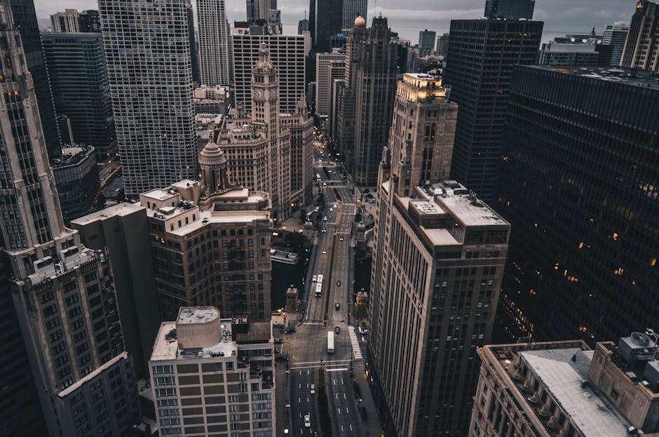 Downtown Chicago streets with tall skyscrapers looking up