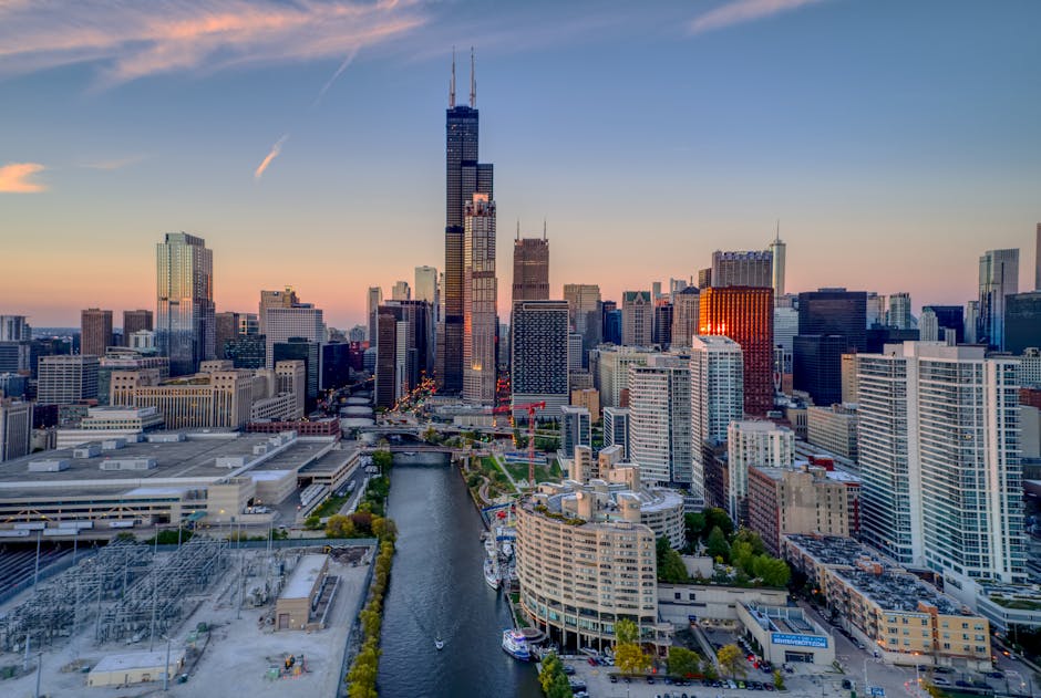 Aerial view of Chicago skyline at sunset with Willis Tower prominent