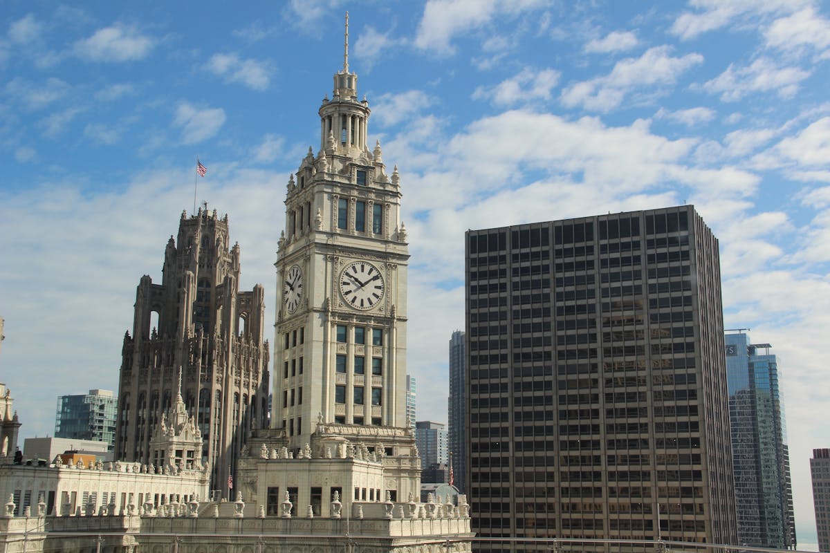 Wrigley Building and Tribune Tower against blue skies in Chicago