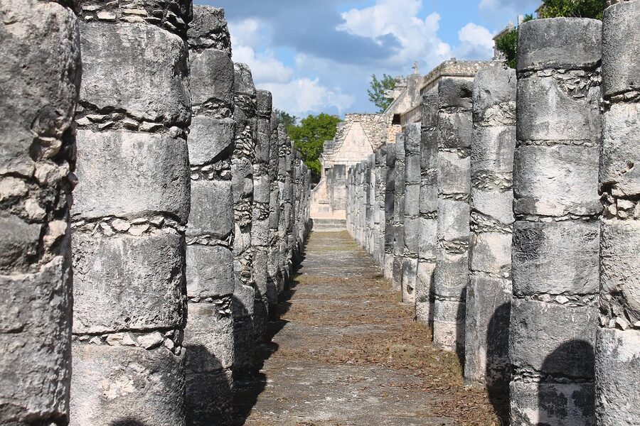 Rows of carved stone columns at Chichen Itza Thousand Columns complex