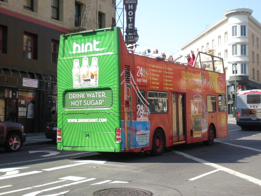 City Sightseeing San Francisco tour bus passing through North Beach