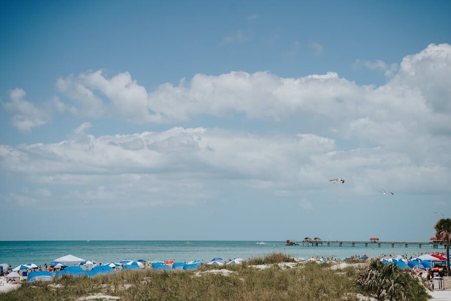 Clearwater Beach with umbrellas and overcast sky