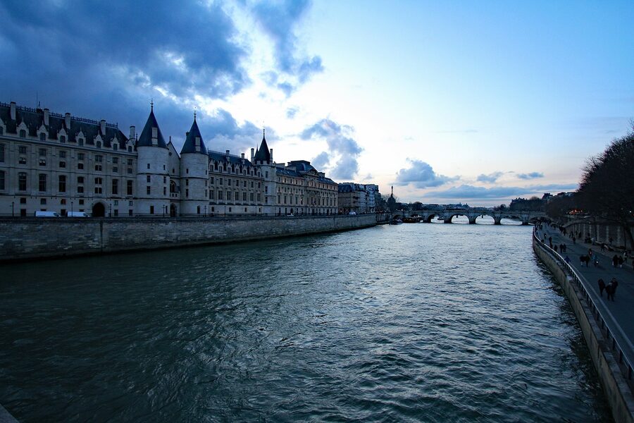 The Conciergerie along the Seine river in Paris