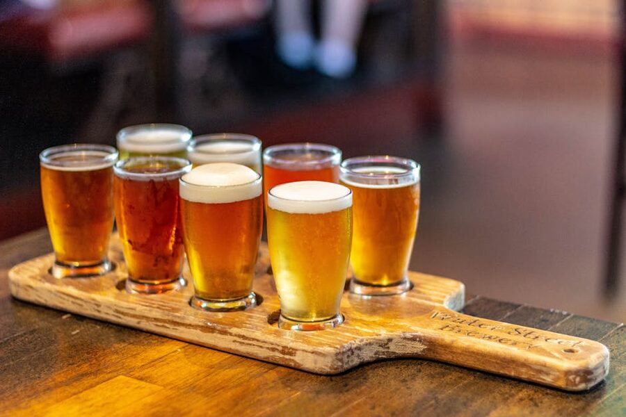 Craft beer tasting paddle on a wooden board