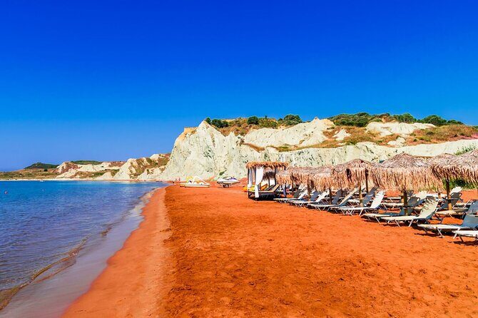 Cruise to White Rocks & Xi Beach with lunch and wine - Mania Beach: A Colorful Surprise