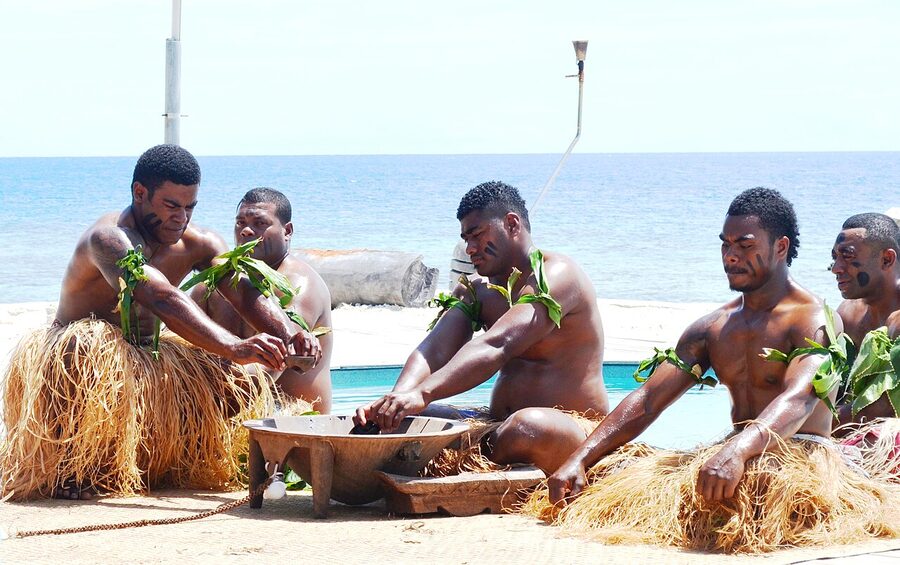 Fijian kava ceremony with traditional tanoa bowl