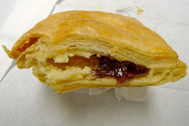 A Cuban guava and cream cheese pastelito on a plate