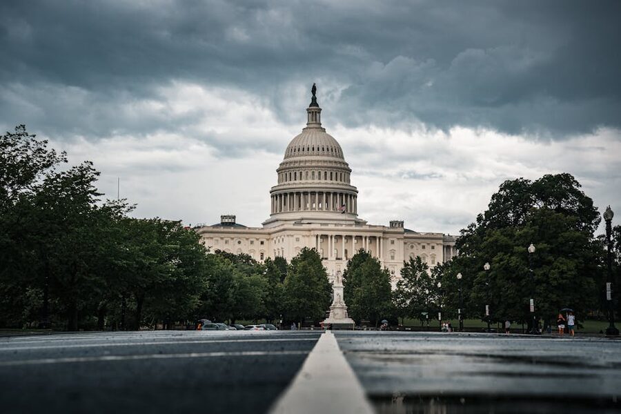 United States Capitol under dramatic cloudy sky