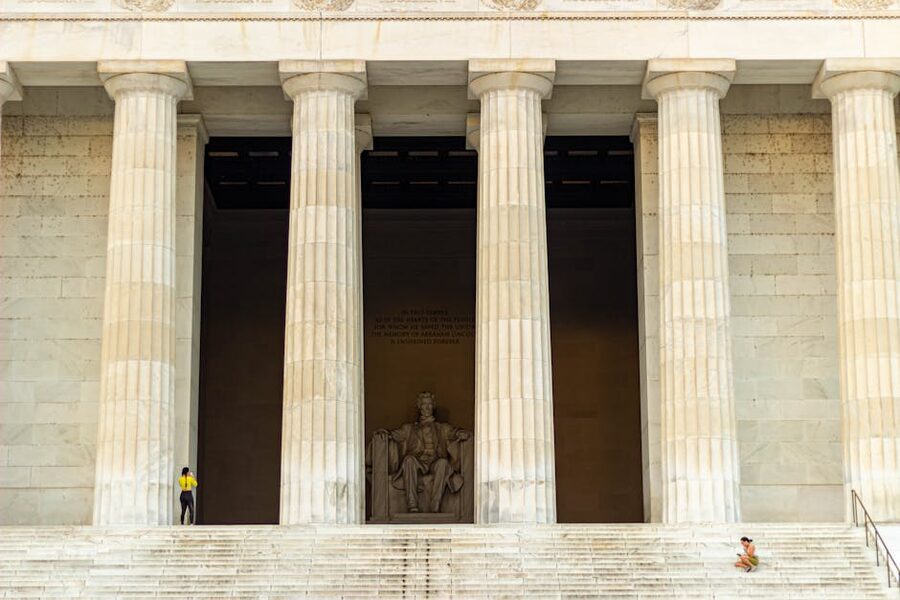 Visitors on the steps of the Lincoln Memorial