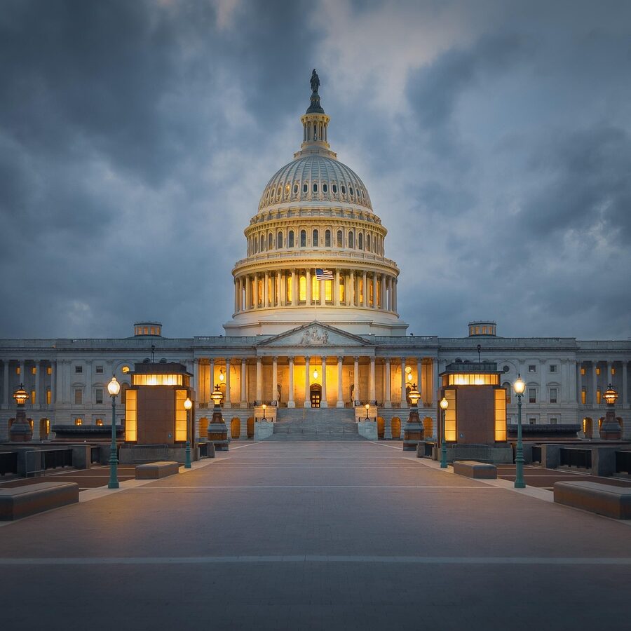 US Capitol illuminated at night in Washington DC