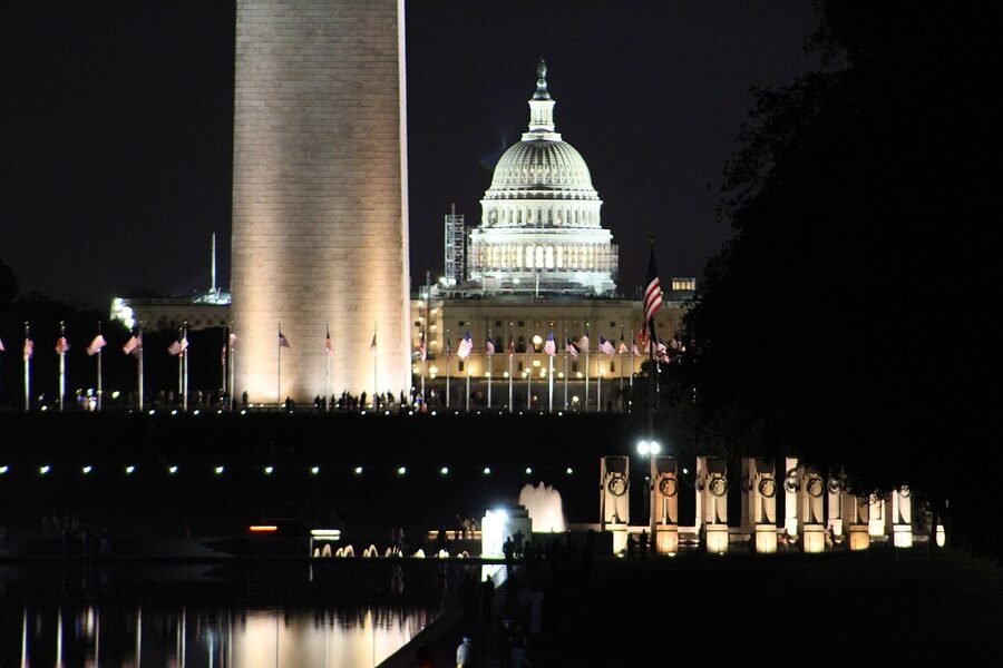 Capitol dome Washington Monument and WWII Memorial at night