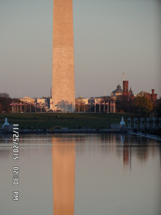 Washington Monument reflected in the Reflecting Pool at dusk