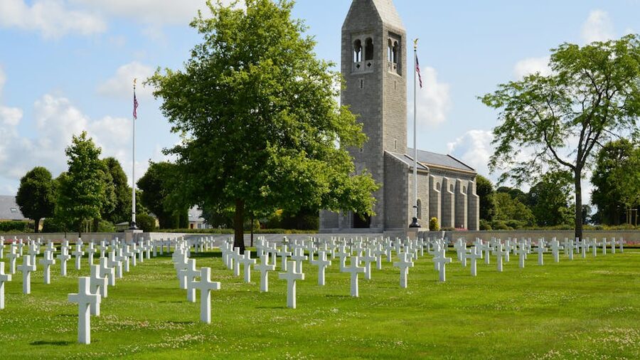 Memorial chapel and rows of white crosses at the Normandy American Cemetery, Colleville-sur-Mer