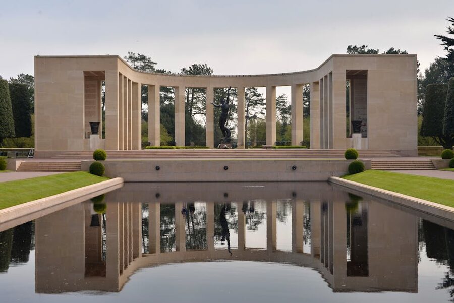 Reflecting pool and statue at the Normandy American Cemetery memorial, Colleville-sur-Mer