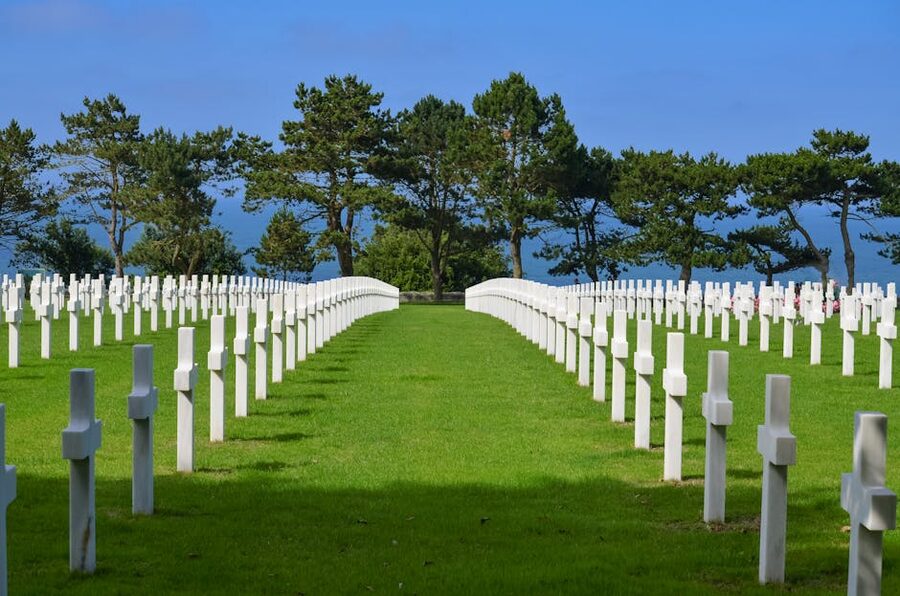 White crosses in symmetric rows at the Normandy American Cemetery, Colleville-sur-Mer