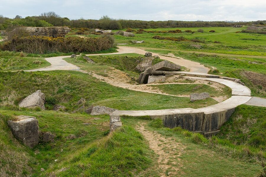 Bomb craters and concrete remains on the Pointe du Hoc battlefield, Normandy