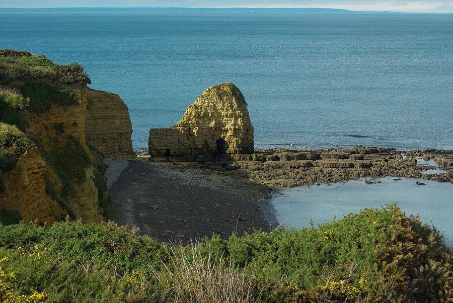 Bomb craters and damaged fortifications at Pointe du Hoc, Normandy, France