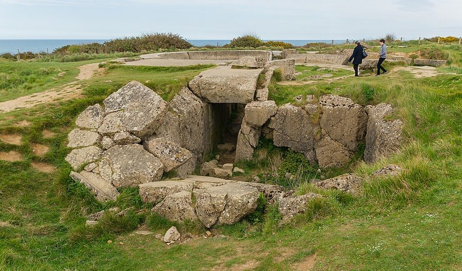Tourists at a German bunker on the Pointe du Hoc battlefield, Normandy