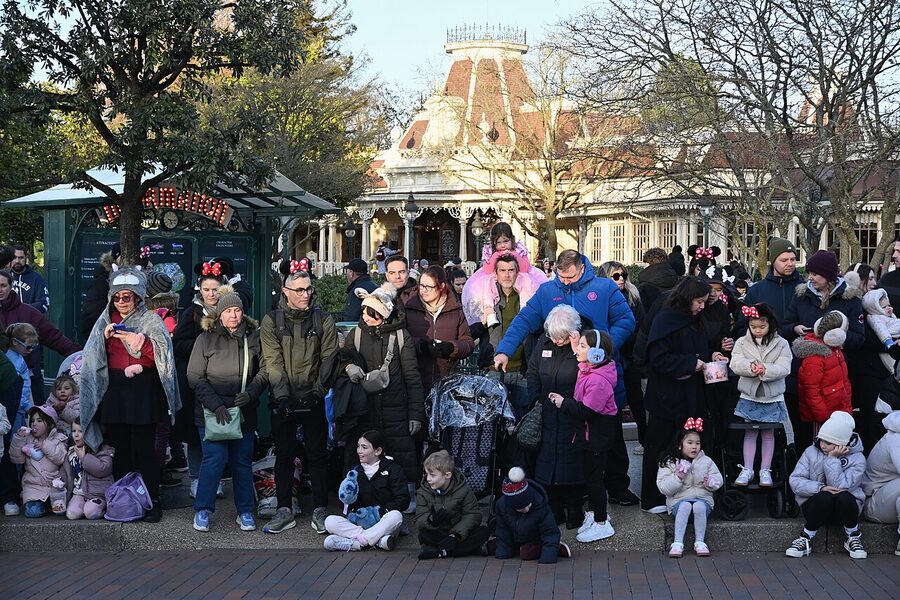 Visitors waiting for the parade at Disneyland Paris