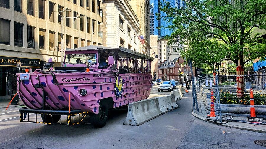 Duck boat passing the Old State House in Boston