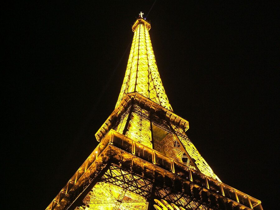 Eiffel Tower illuminated against the Paris night sky