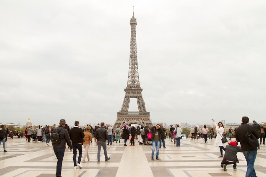 Tourist crowd at the base of the Eiffel Tower Paris