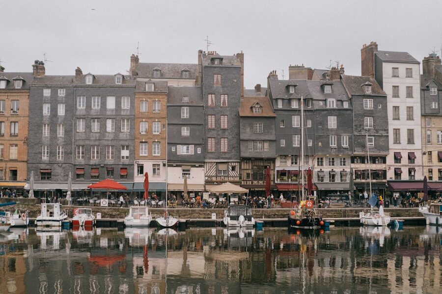 Honfleur old harbor reflections in calm water