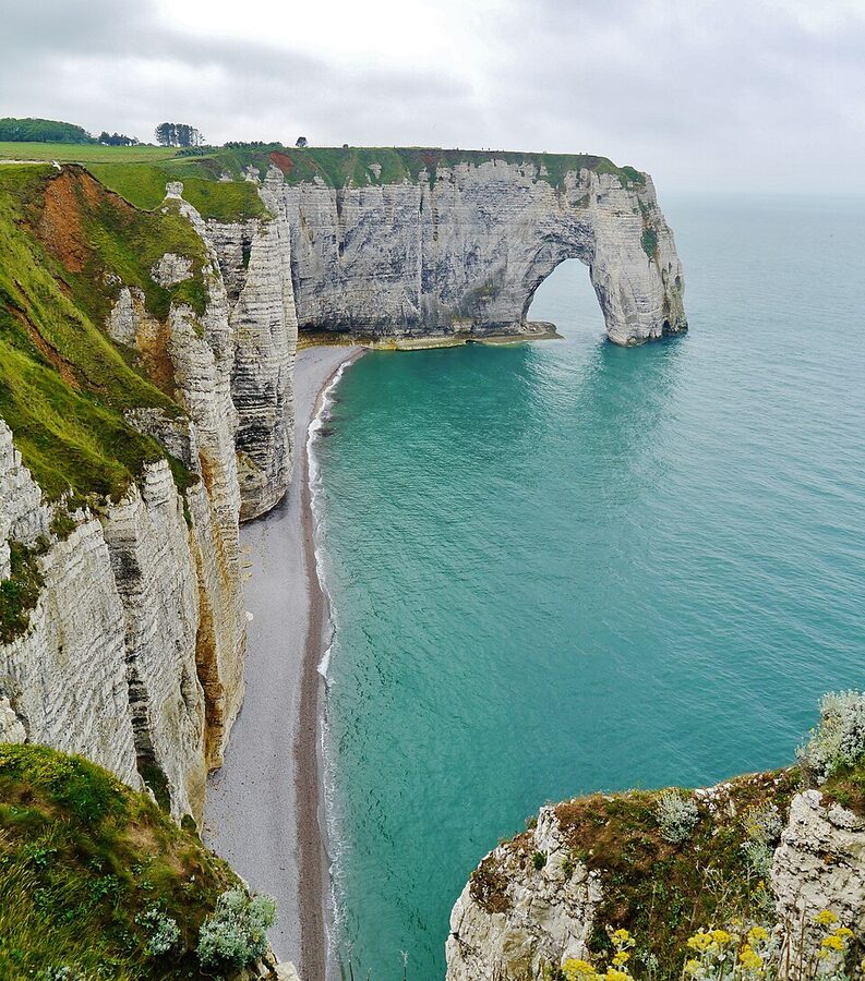Manneporte natural arch Etretat from beach
